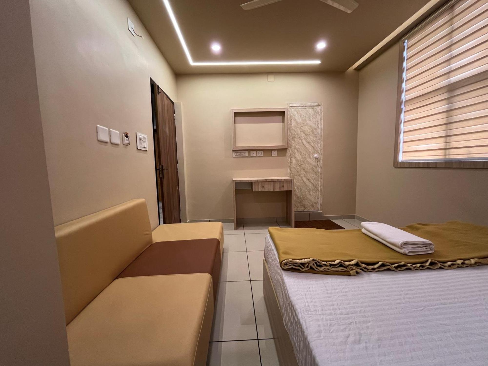 Rooms of Fam Stay & Health club ,Kannur - Hotel in Kannur