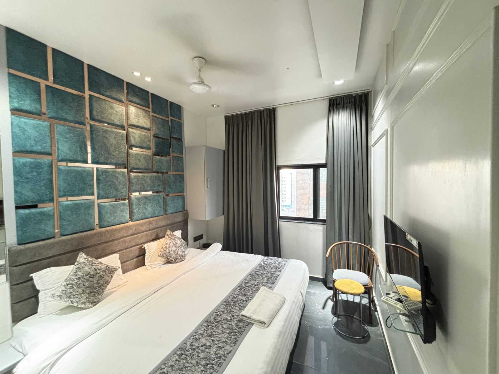 Rooms of Hotel O Kadodara Surat Formerly Rolex - Hotel in Palsana