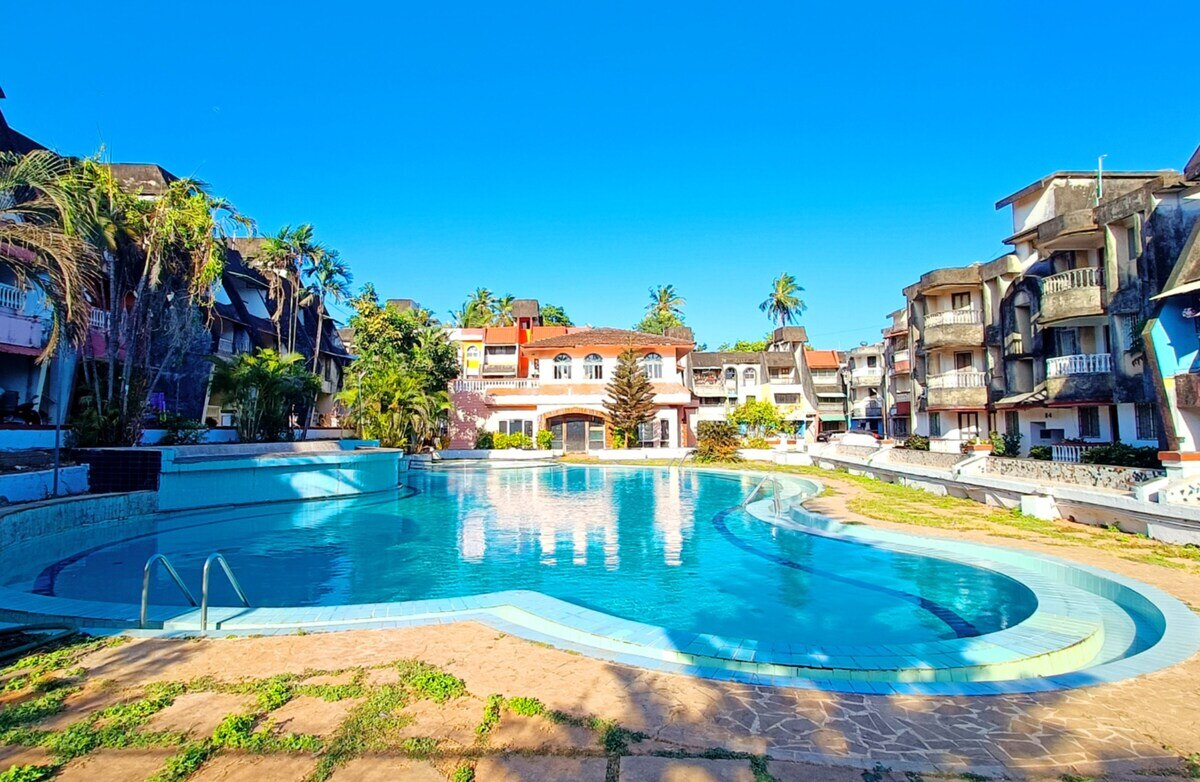 1BHK Apt with Swimming pool near Colva Beach 𝗕𝗢𝗢𝗞 Goa Apartment