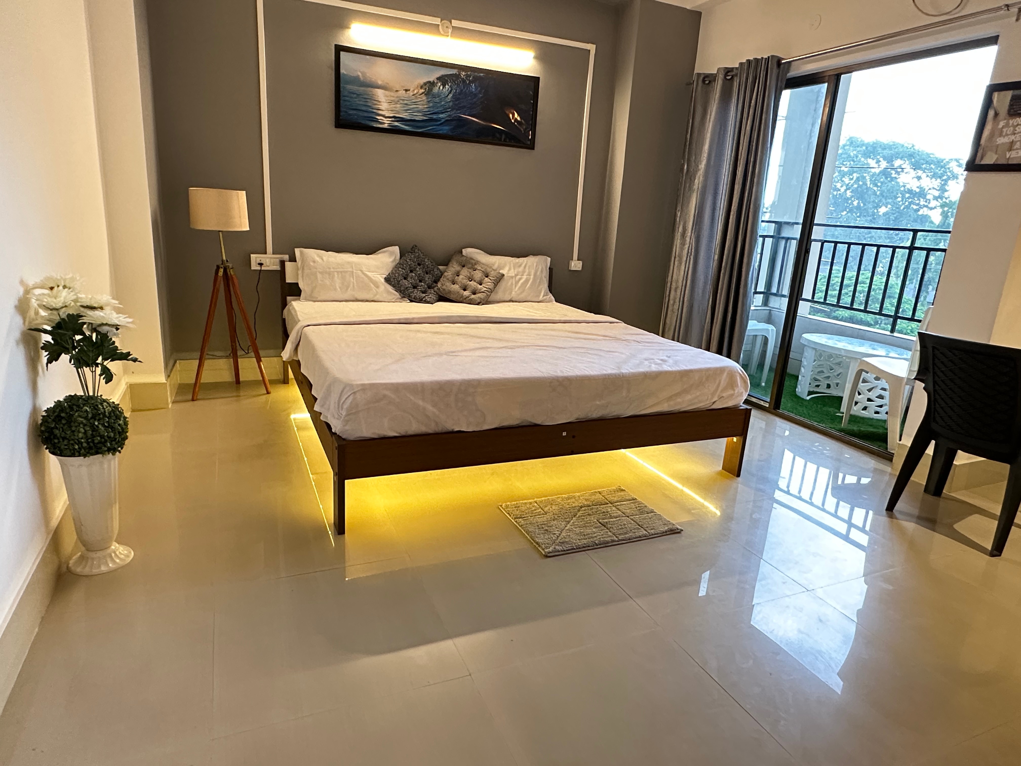La Club view master bedroom with balcony Homestay Jorhat - Reviews ...
