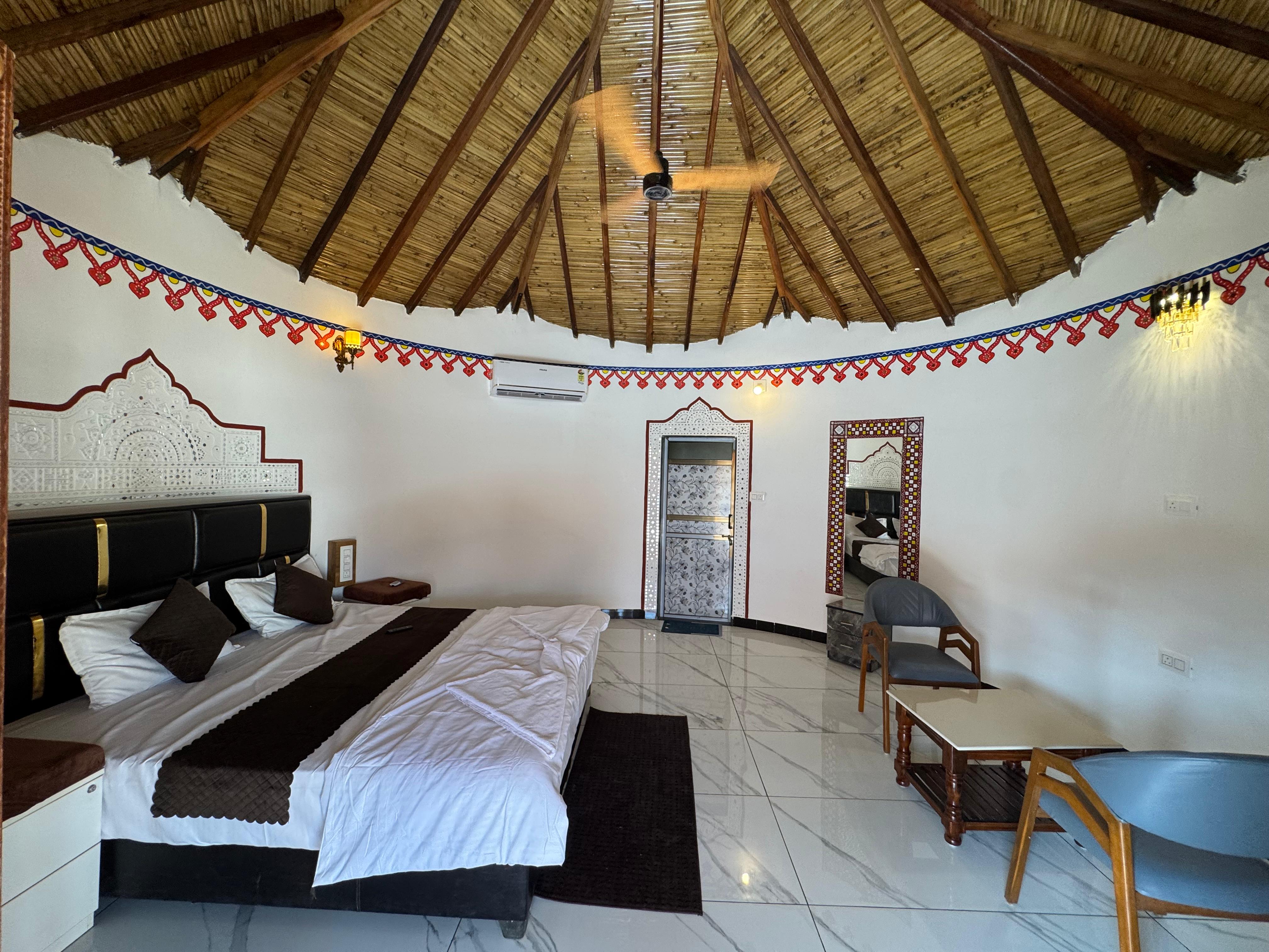 Rooms of Dholavira Desert Homestay - Rann Of Kutch Hotel on Goibibo
