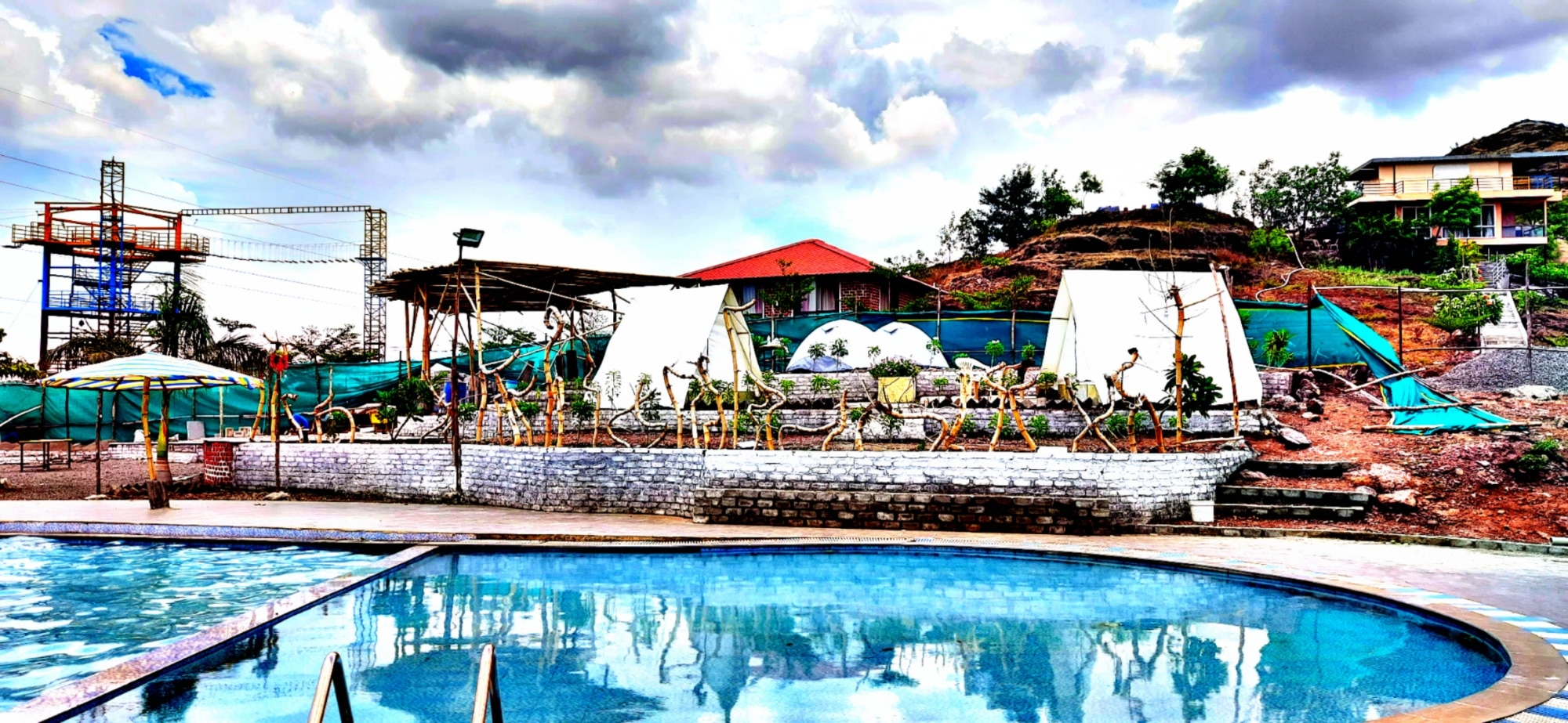 ANTHURIUM RESORT By WB Inn 𝗕𝗢𝗢𝗞 Pune Homestay